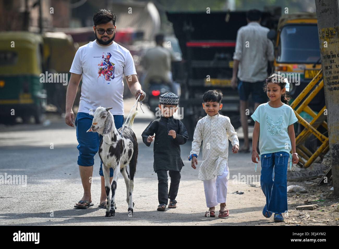 NEW DELHI, INDIA - MAY 28: A Muslim family take sacrificial goats ...