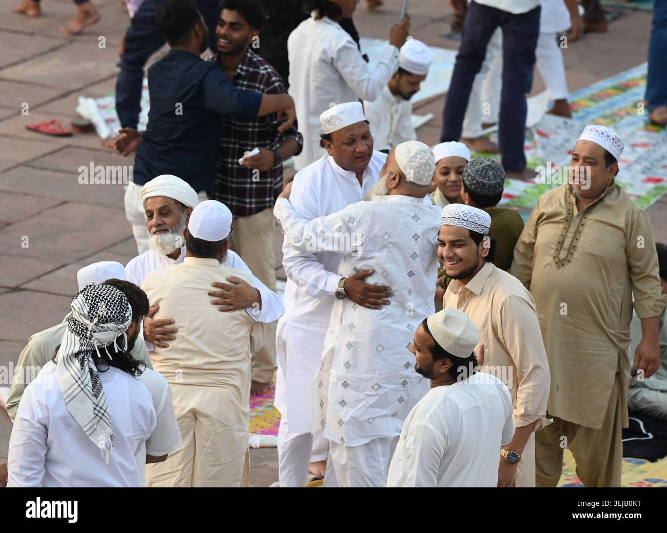 NEW DELHI, INDIA - MAY 28: Muslim hug each other after congregational ...