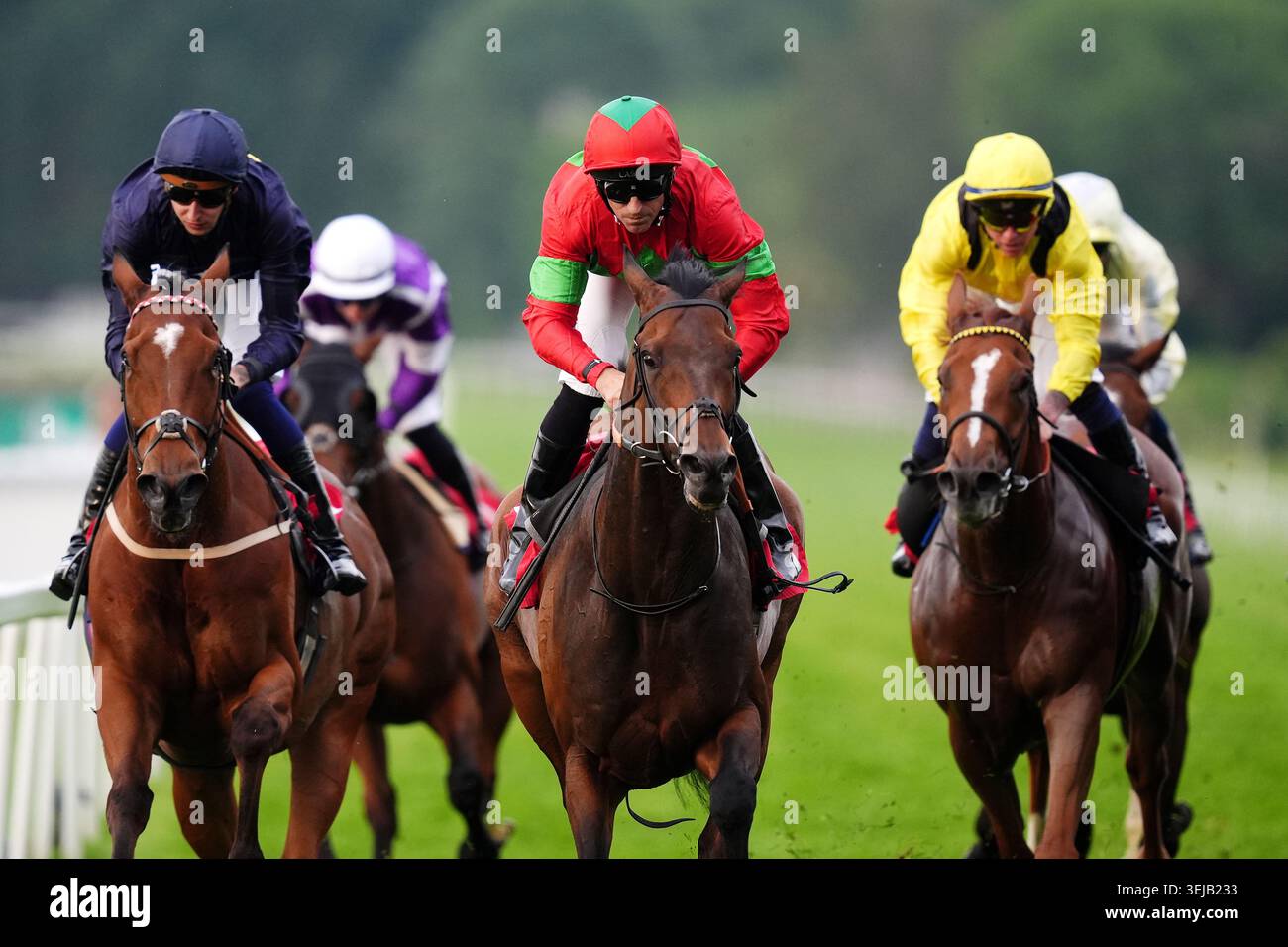 Boyfriend ridden by Pat Dobbs (centre) wins the starsports.bet Whitsun ...