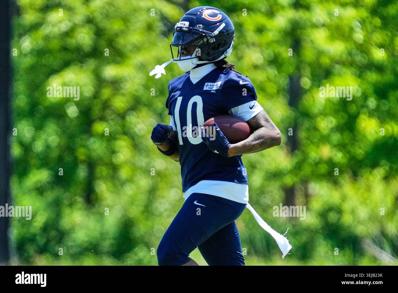 Chicago Bears wide receiver Luther Burden III runs on the field during ...
