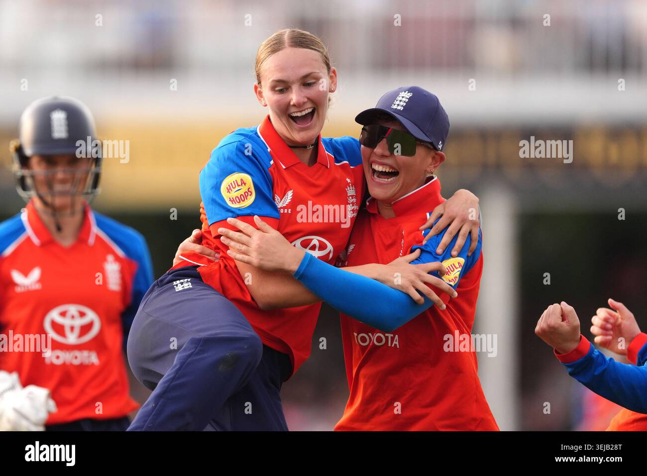 England's Tilly Corteen-Coleman and Issy Wong celebrate the wicket of ...