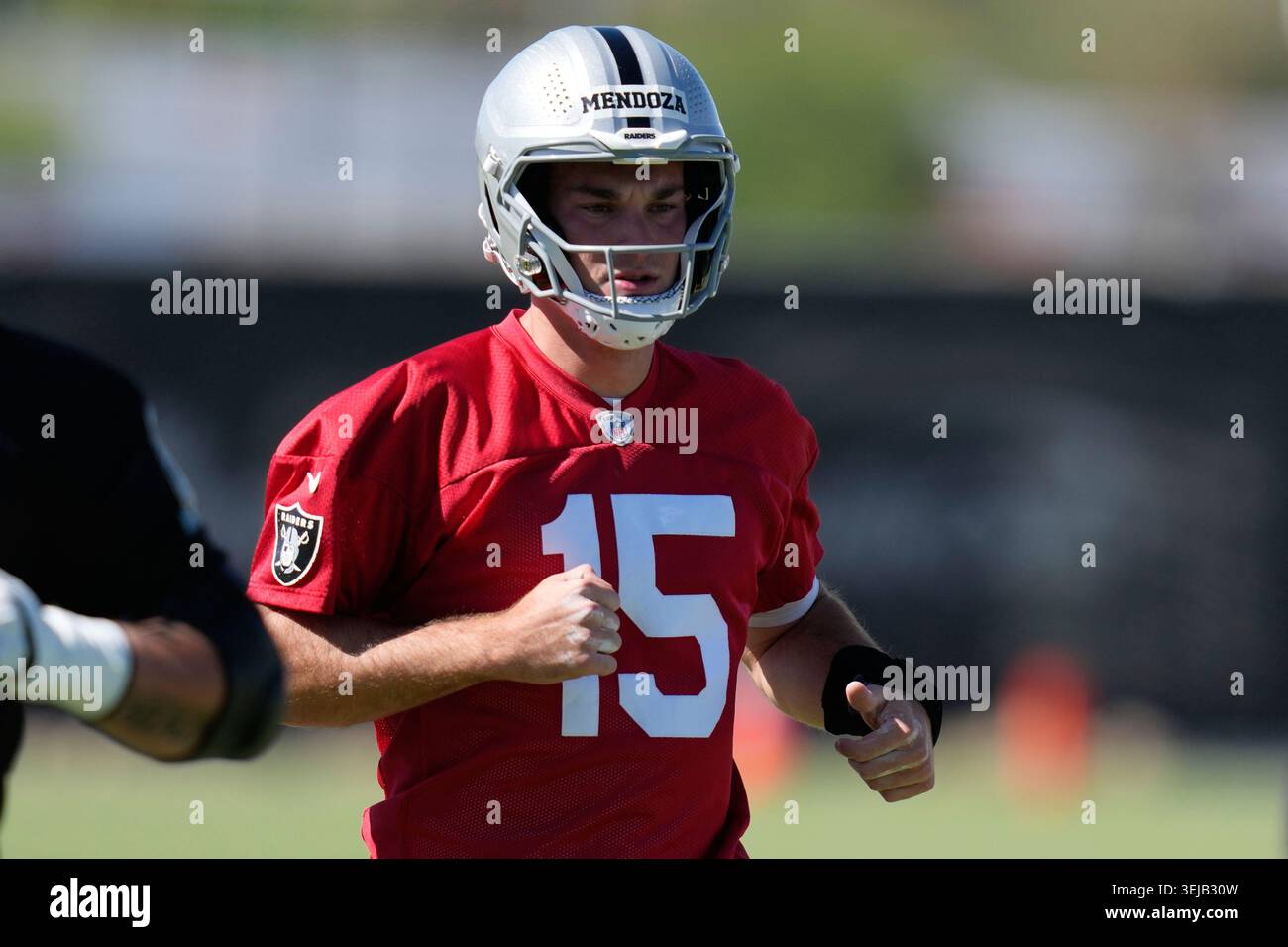Las Vegas Raiders quarterback Fernando Mendoza (15) warms up during the ...