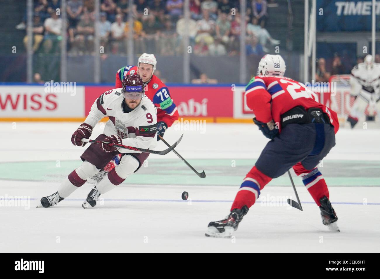 FRIBOURG, SWITZERLAND - MAY 28: Renars Krastenbergs of Latvia L) in ...