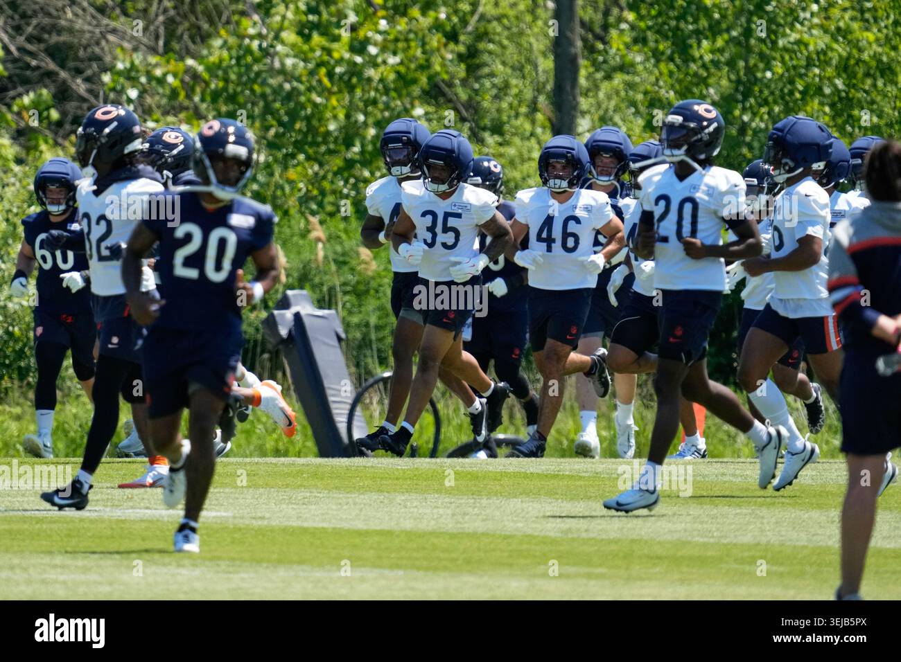 Chicago Bears players warm up during the NFL football team's practice ...