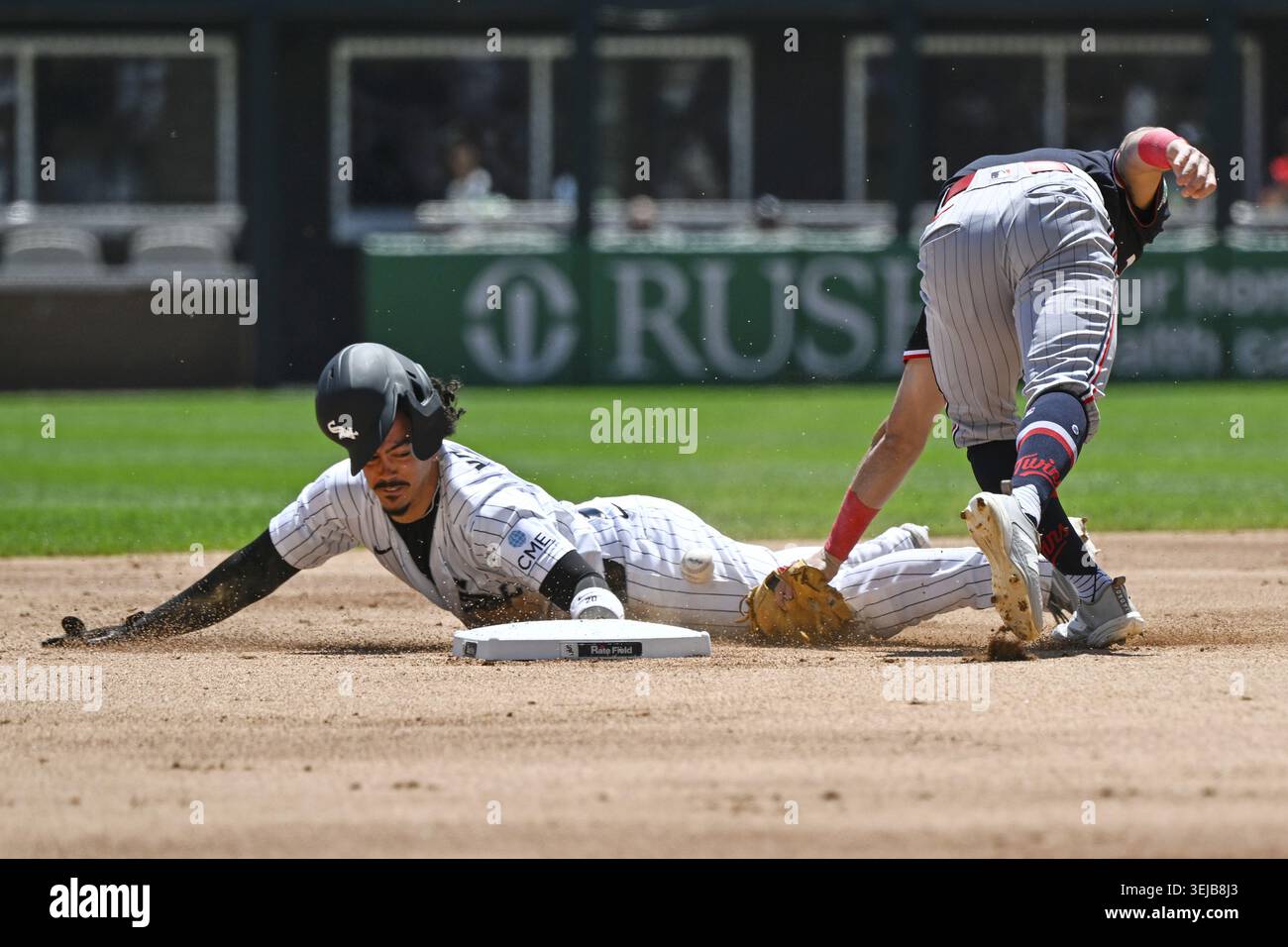 Chicago White Sox's Miguel Vargas, left, safely steals second base past ...