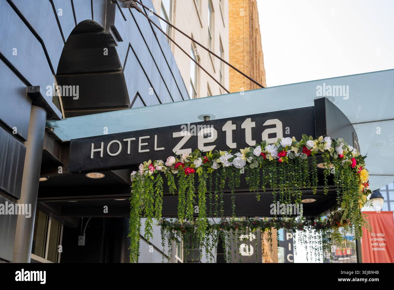 Hotel Zetta entrance canopy with floral decorations and hanging ...