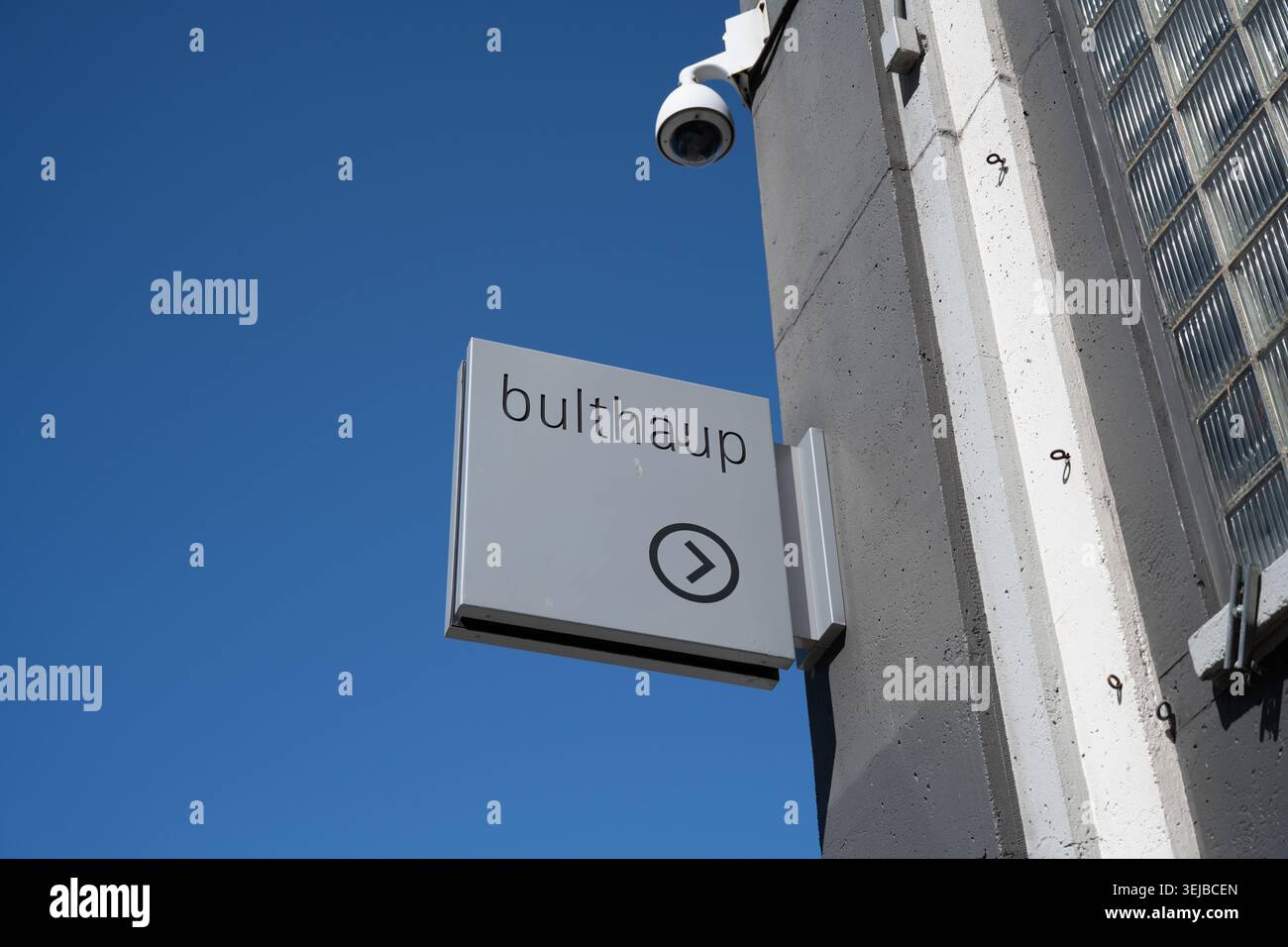 Bulthaup sign and security camera mounted on exterior of modern ...