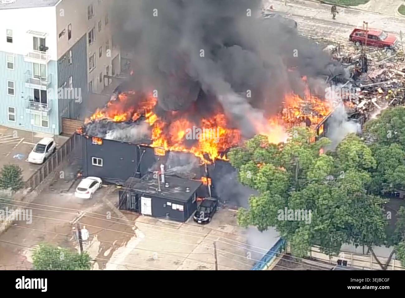 This image made from video provided by KDFW FOX 4 shows a large fire at ...