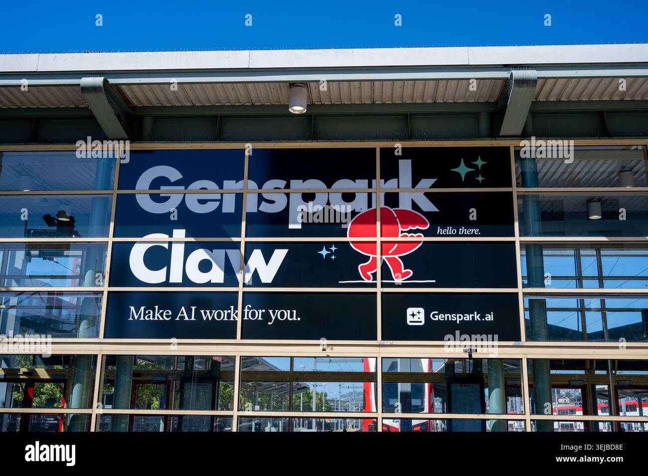 Exterior advertising banner for Genspark Claw AI service on glass ...