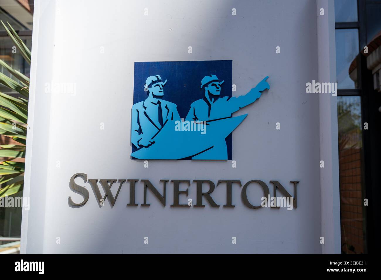 Swinerton construction company logo and signage on exterior column of a ...