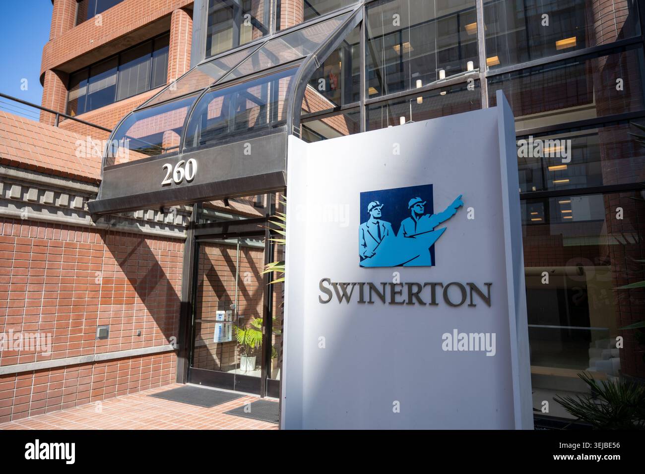 Entrance to Swinerton building with company logo and street number 260 ...