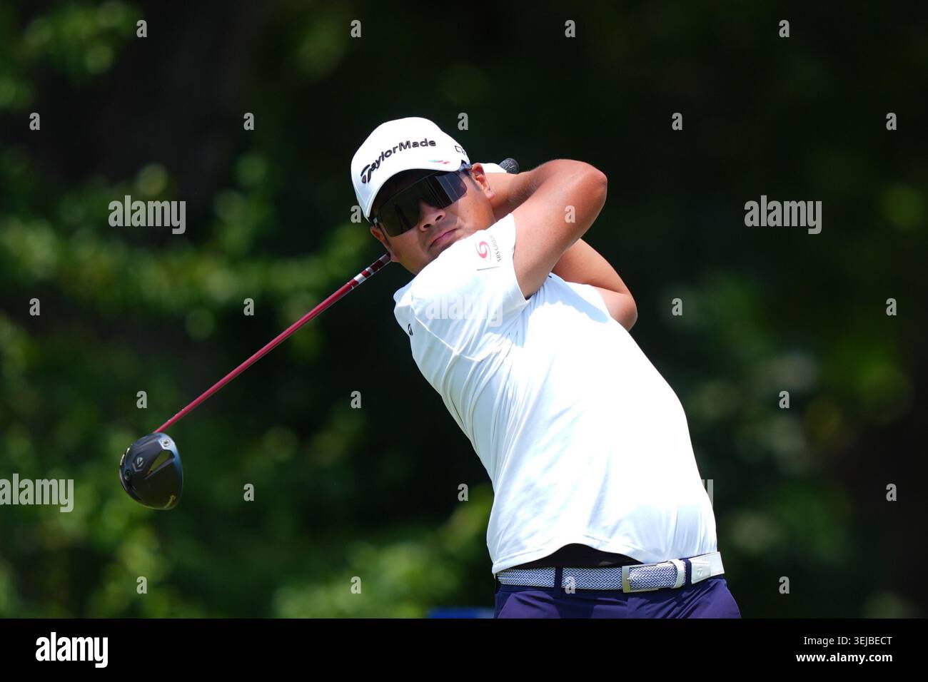 Ryo Hisatsune, of Japan, watches his tee shot on the 12th hole during ...