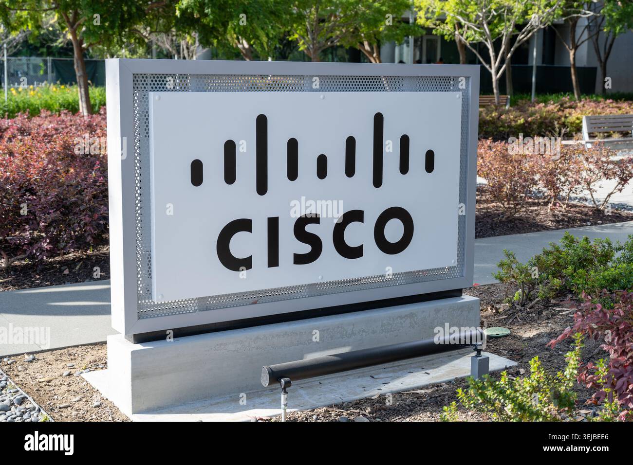 Cisco logo on outdoor sign surrounded by landscaping on a sunny day ...