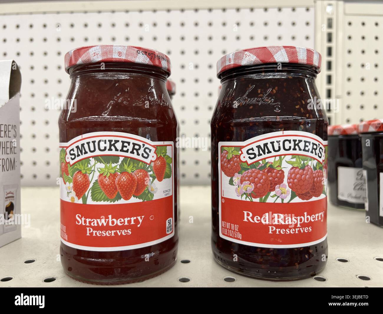 Jars of Smucker's brand jam are seen on a store shelf, Lafayette ...