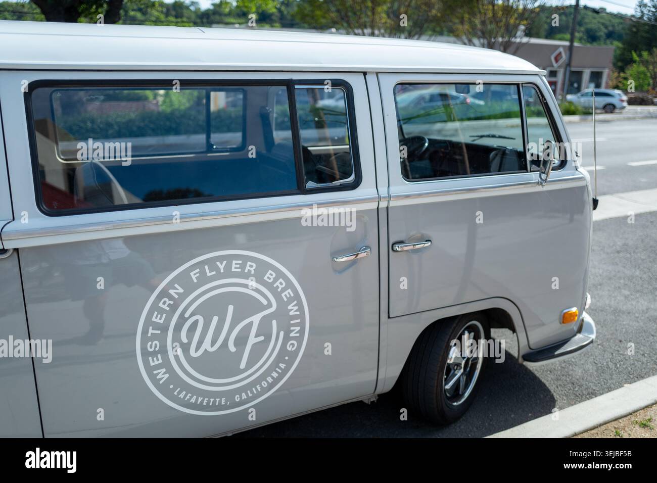 A classic Volkswagen bus with logo for Western Flyer Brewing is seen in ...
