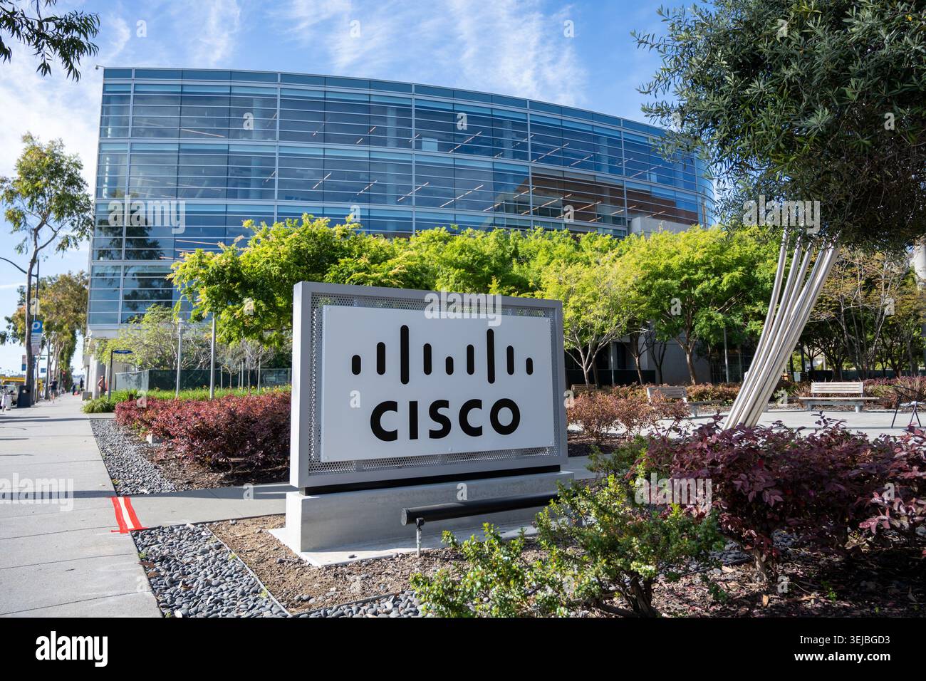 Cisco logo on freestanding sign in front of modern glass office ...