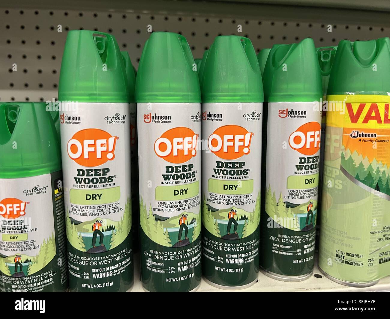 Containers of OFF pest spray or insect repellent on a store shelf in ...