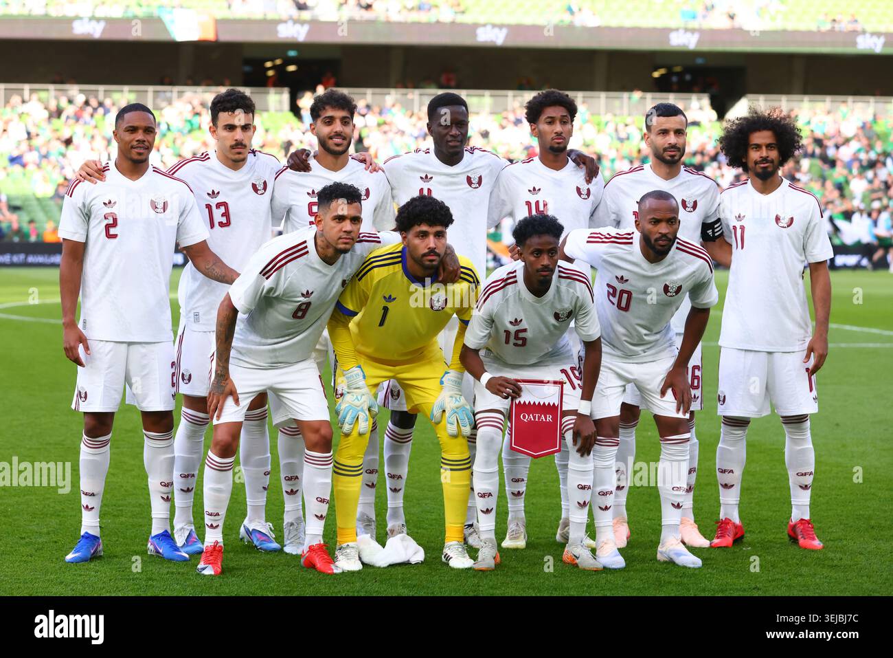 Qatar starting players pose for a team photo at the beginning of the ...