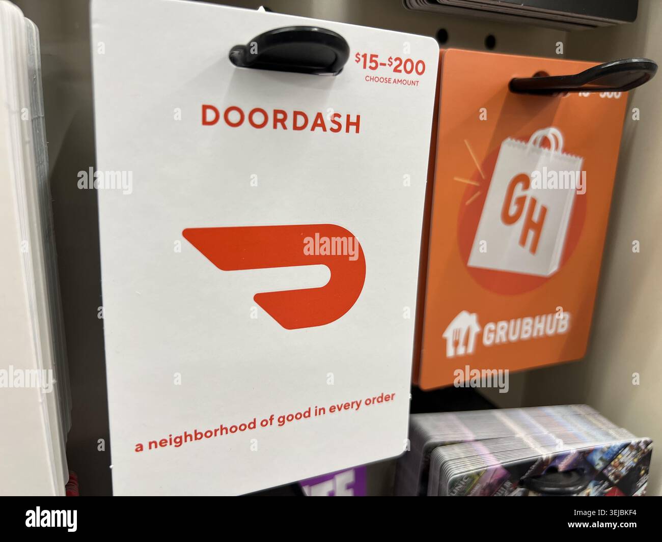 Close-up of Grubhub and Doordash gift cards hanging in a retail store ...