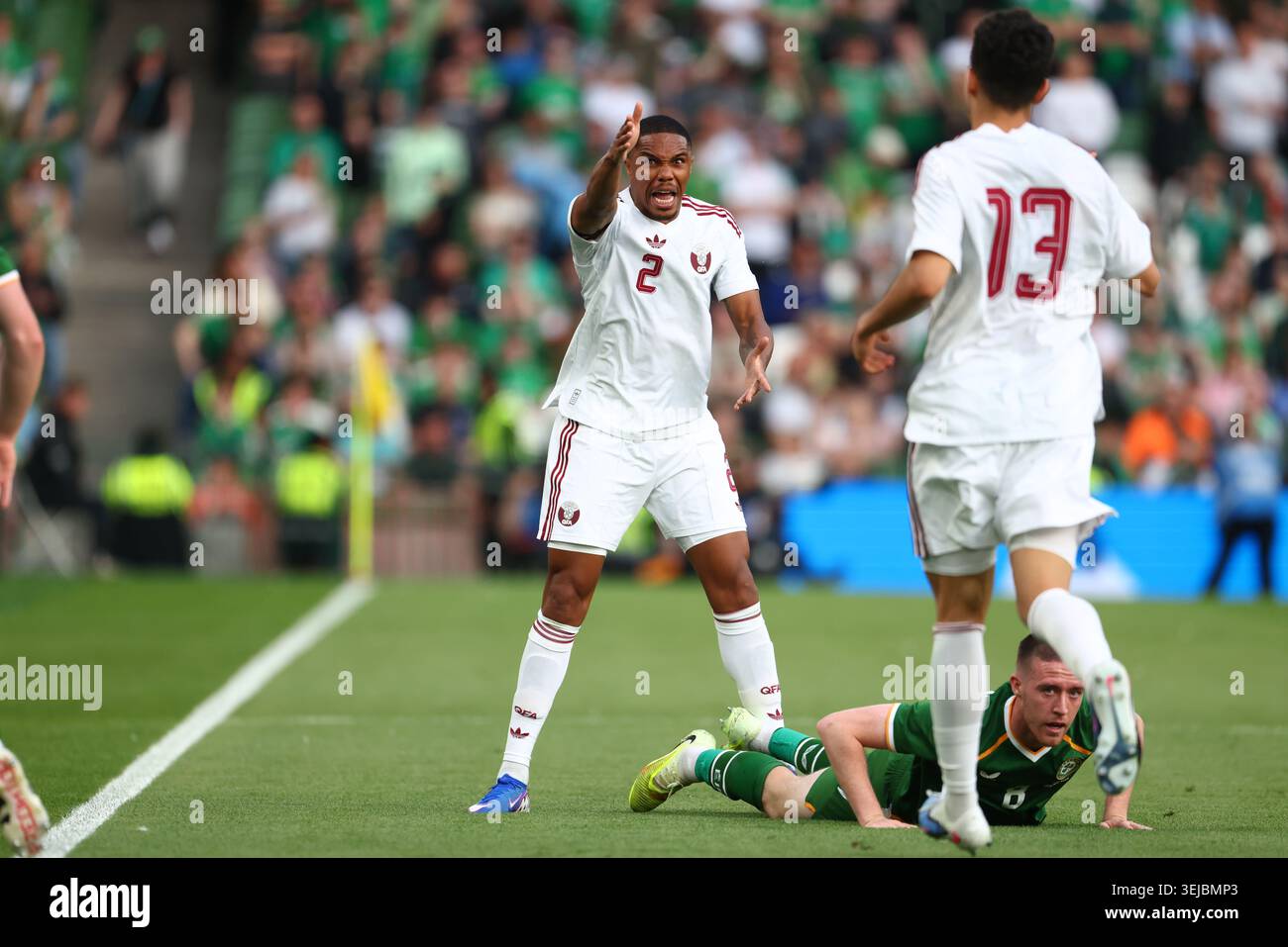 Qatar's Pedro Miguel, centre, reacts during the international friendly ...