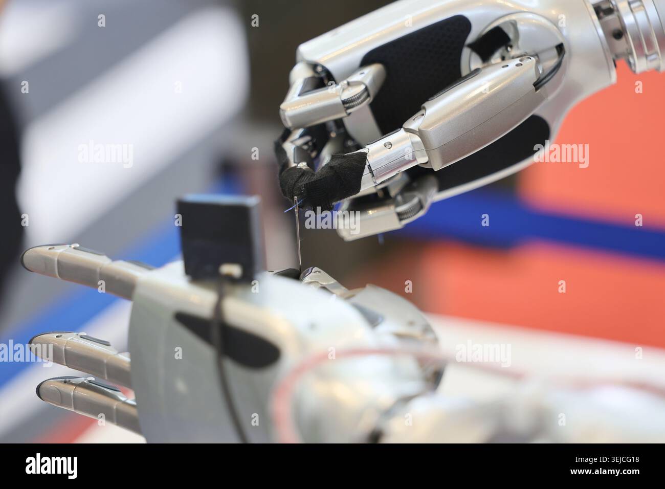 (260529) -- BEIJING, May 29, 2026 (Xinhua) -- A robot threads a needle ...