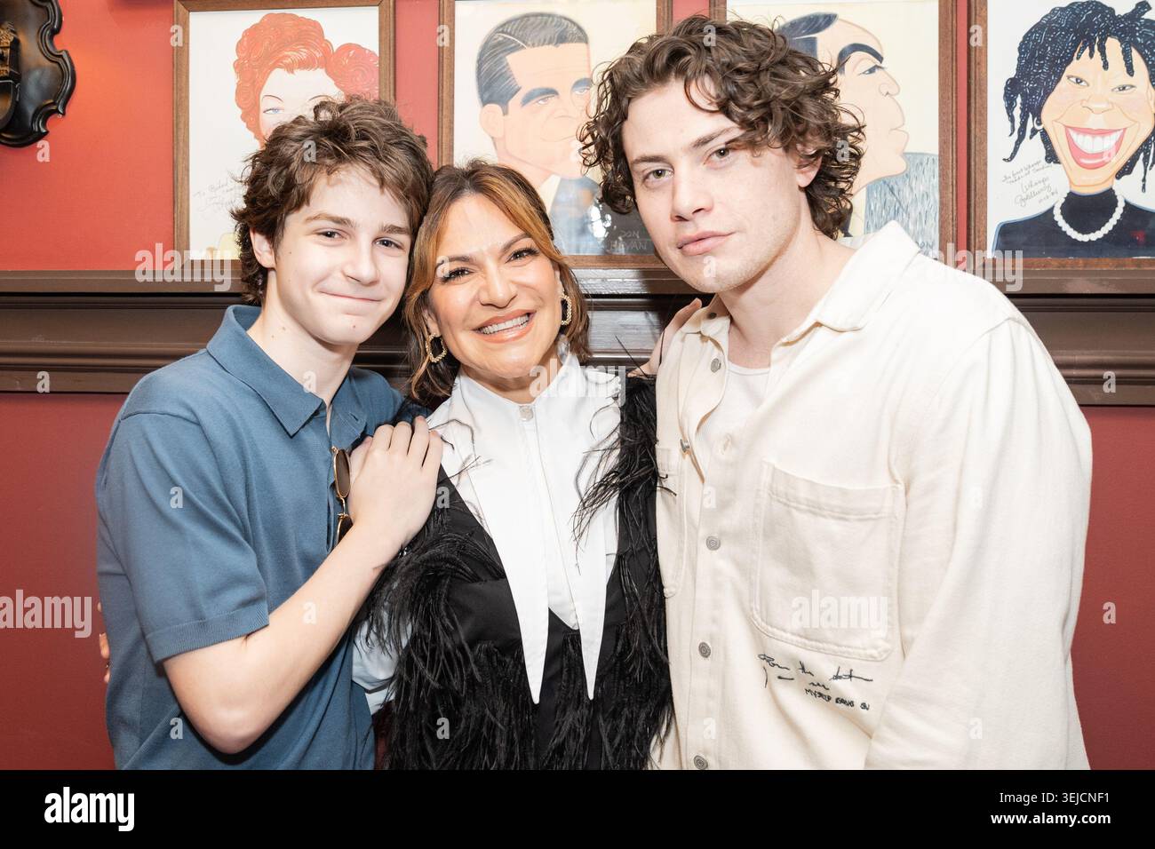 Shoshana Bean (C) poses as she is honored with a portrait at Sardi's in ...