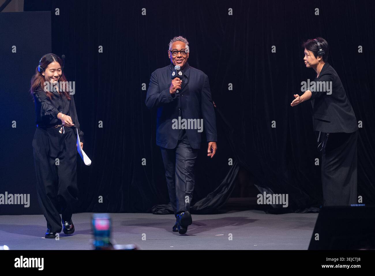 Actor Giancarlo Esposito, center, attends a Comic Con event in Hong ...