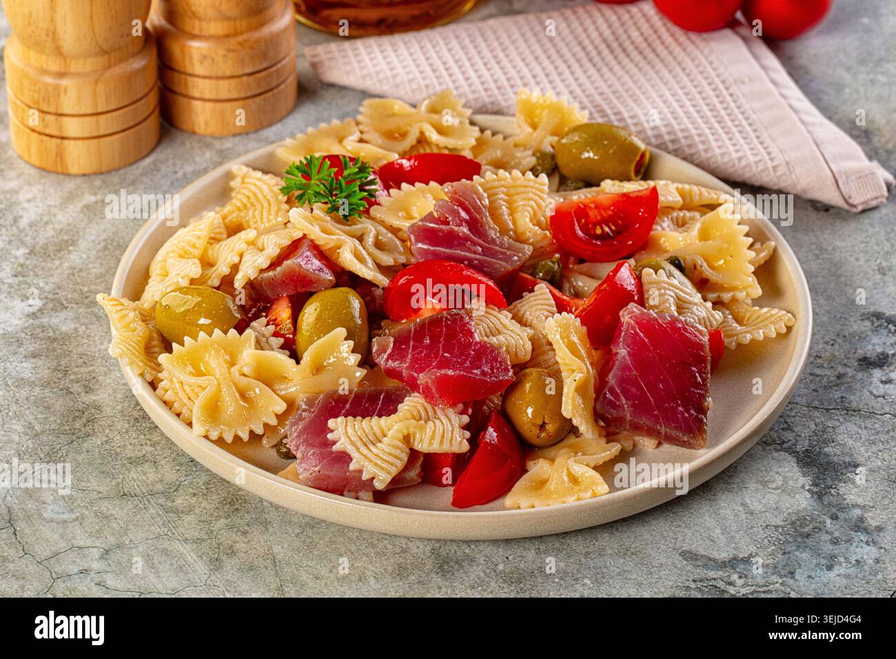 Pasta Farfalle with fresh Tuna fish and tomato Stock Photo - Alamy