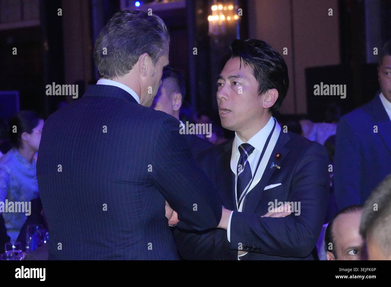 Japan's Defense Minister Shinjiro Koizumi, right, confers with U.S ...