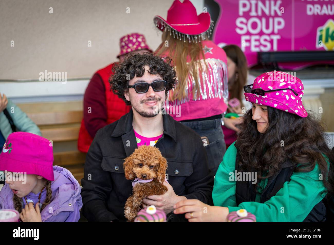 Visitors take part in the Pink Soup Fest celebration, on a railway ...