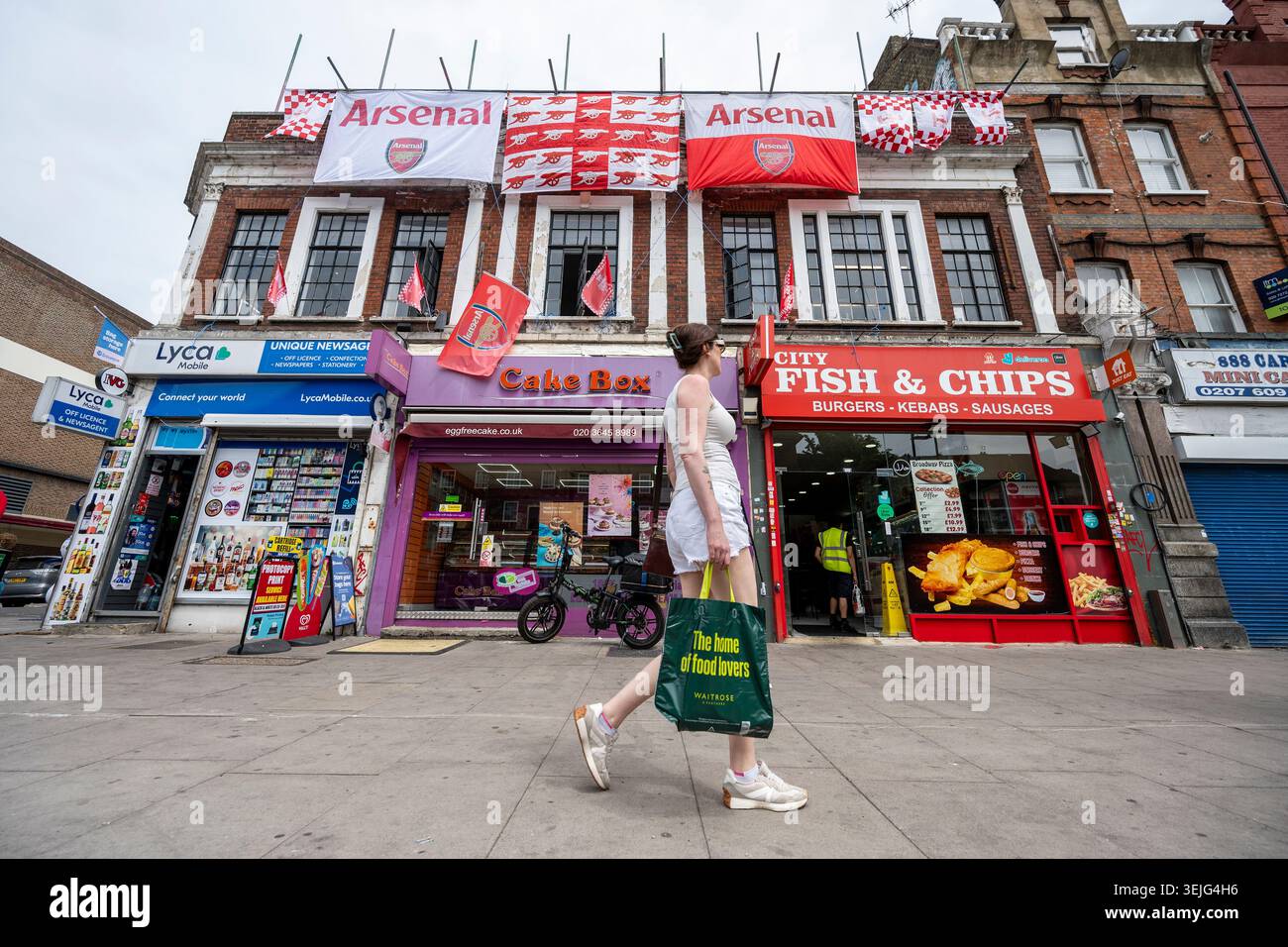 London, UK. 29 May 2026. A building with Arsenal flags as roadside ...