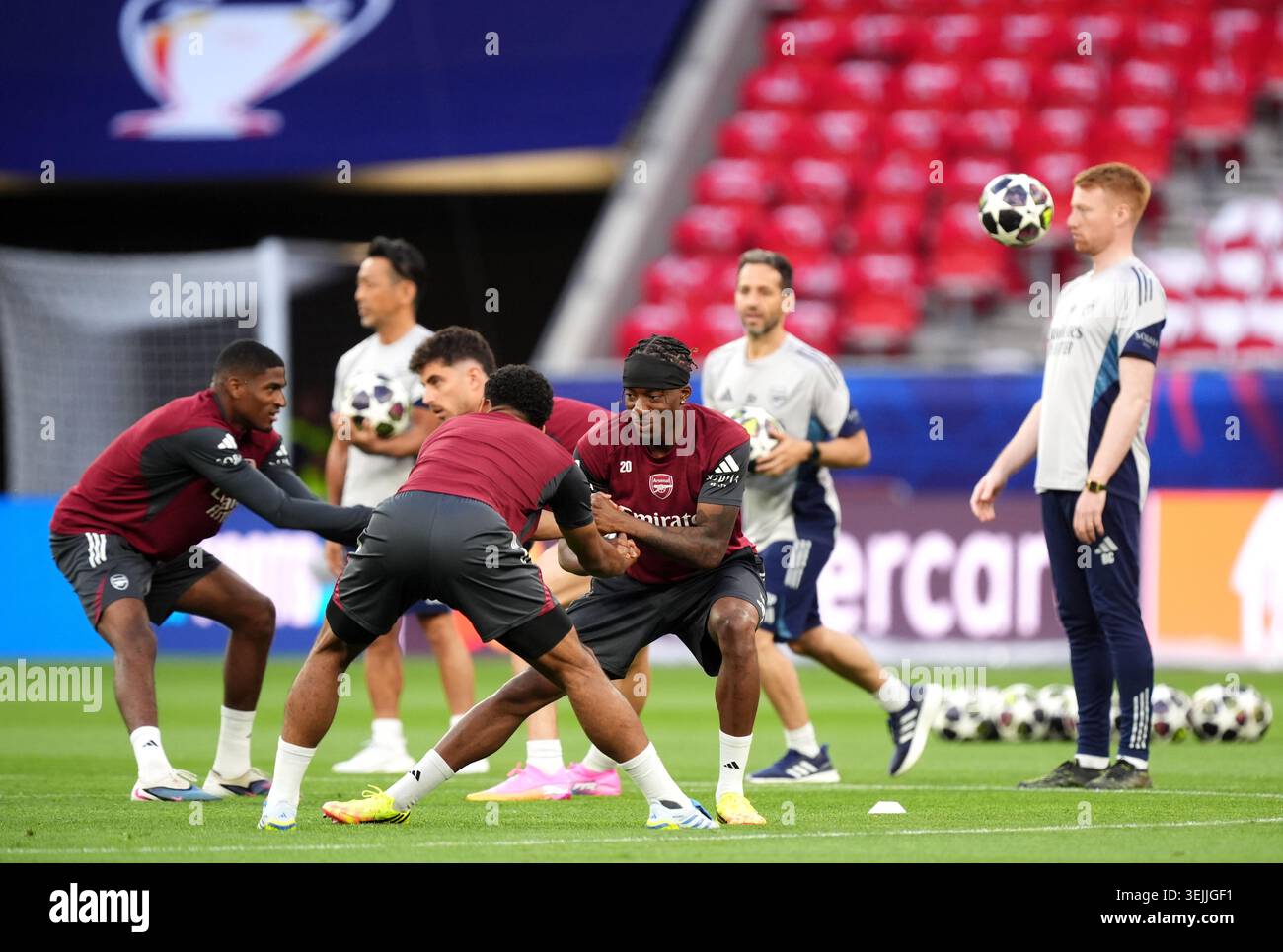 Arsenal's Noni Madueke (centre) during a training session at the Puskas ...