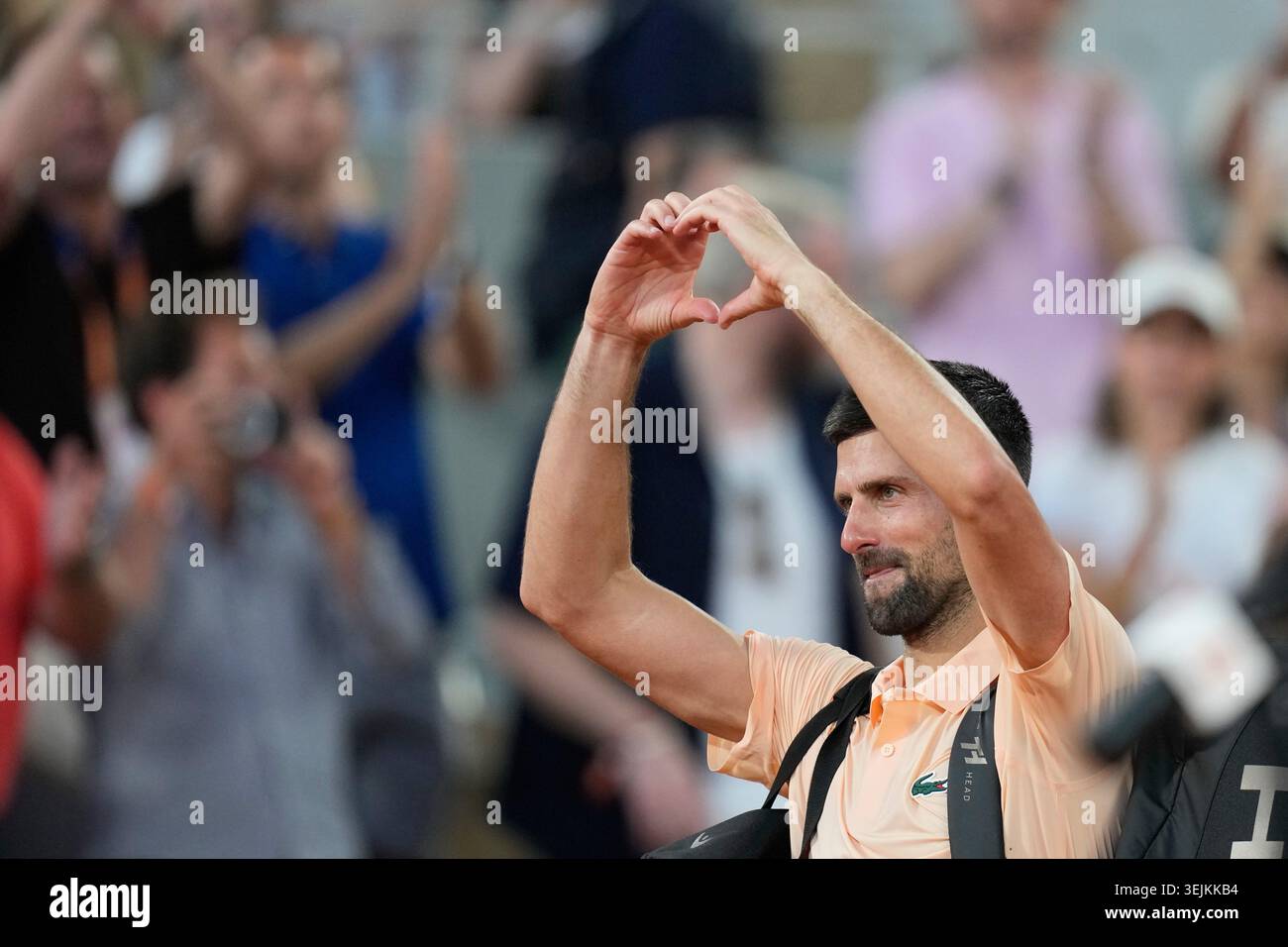 Novak Djokovic of Serbia reacts as he leaves the court after the third ...