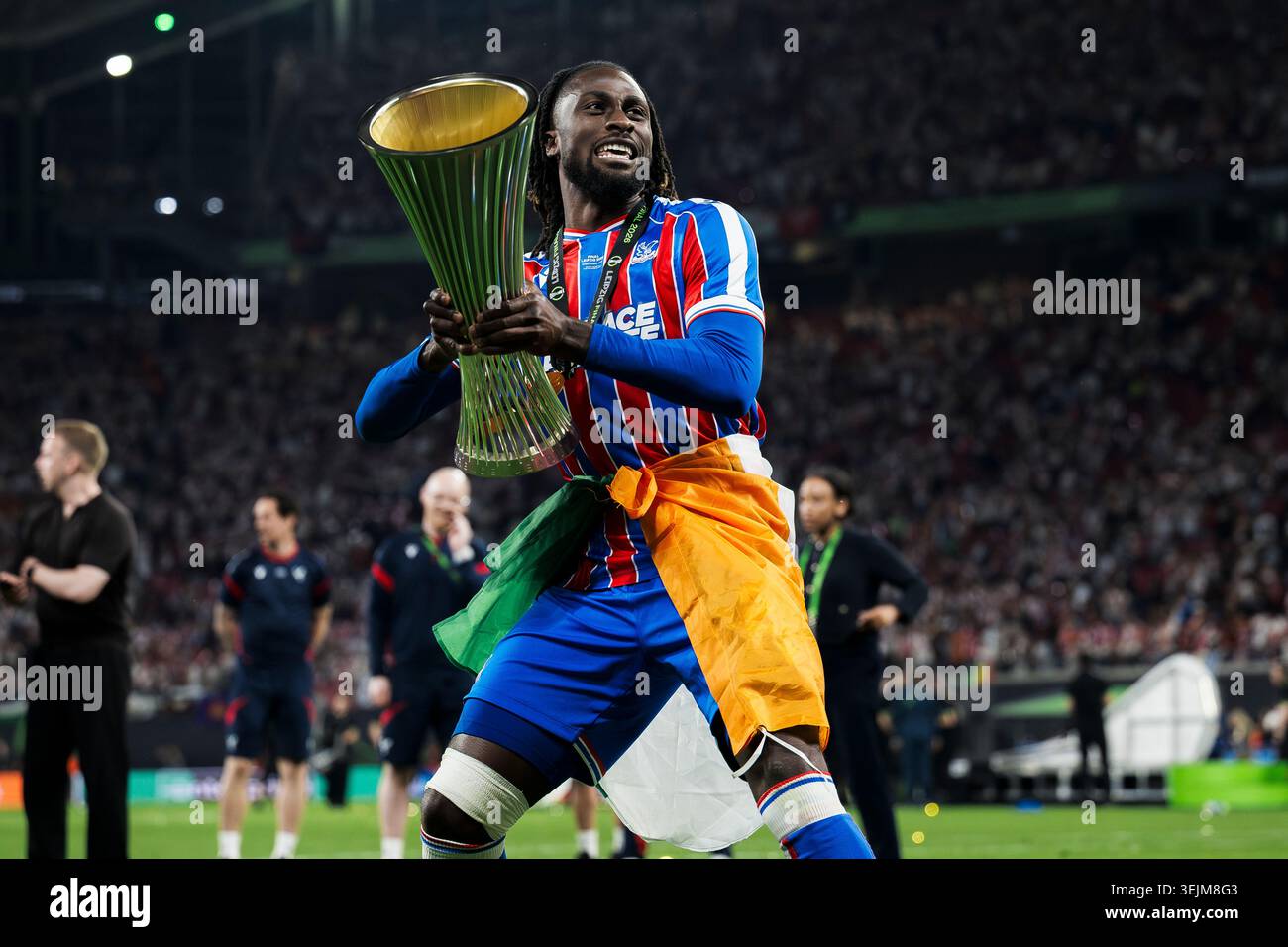 Evann Guessand of Crystal Palace FC lifts the trophy during the award ...
