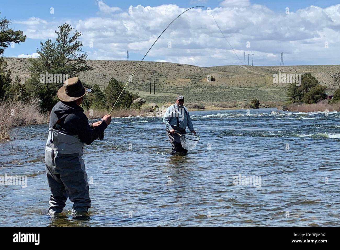 Anglers attempt to land a trout on the Miracle Mile section of the ...