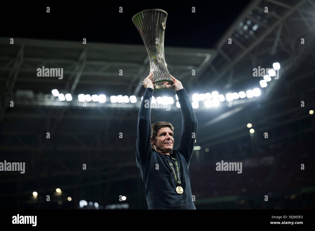 Oliver Glasner, head coach of Crystal Palace FC, lifts the trophy ...