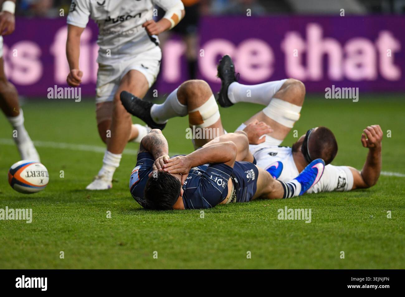 Louis Rees-Zammit of Bristol Bears holds his head in his hands after ...