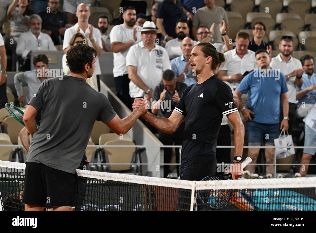 Alexander Zverev of Germany, right, and Quentin Halys of France shake ...