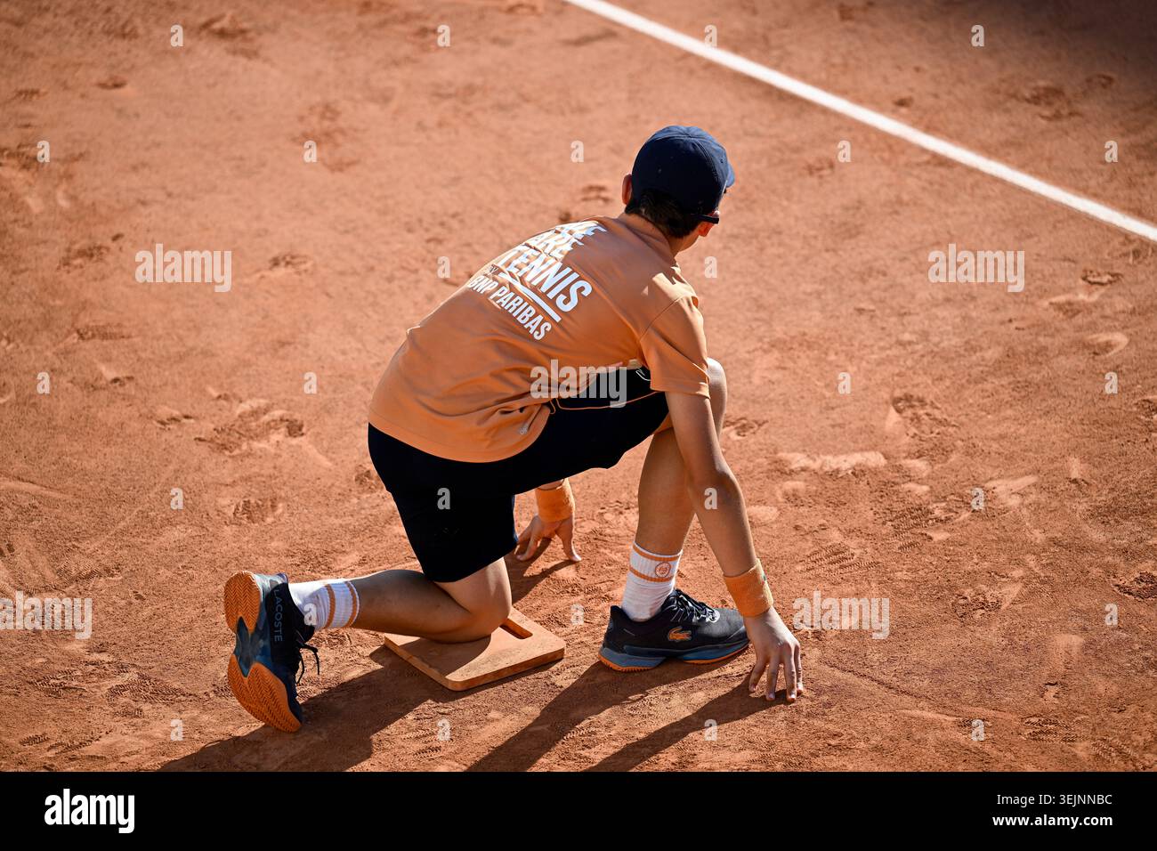 Atmosphere illustration view with a boy ball kid during the French Open ...