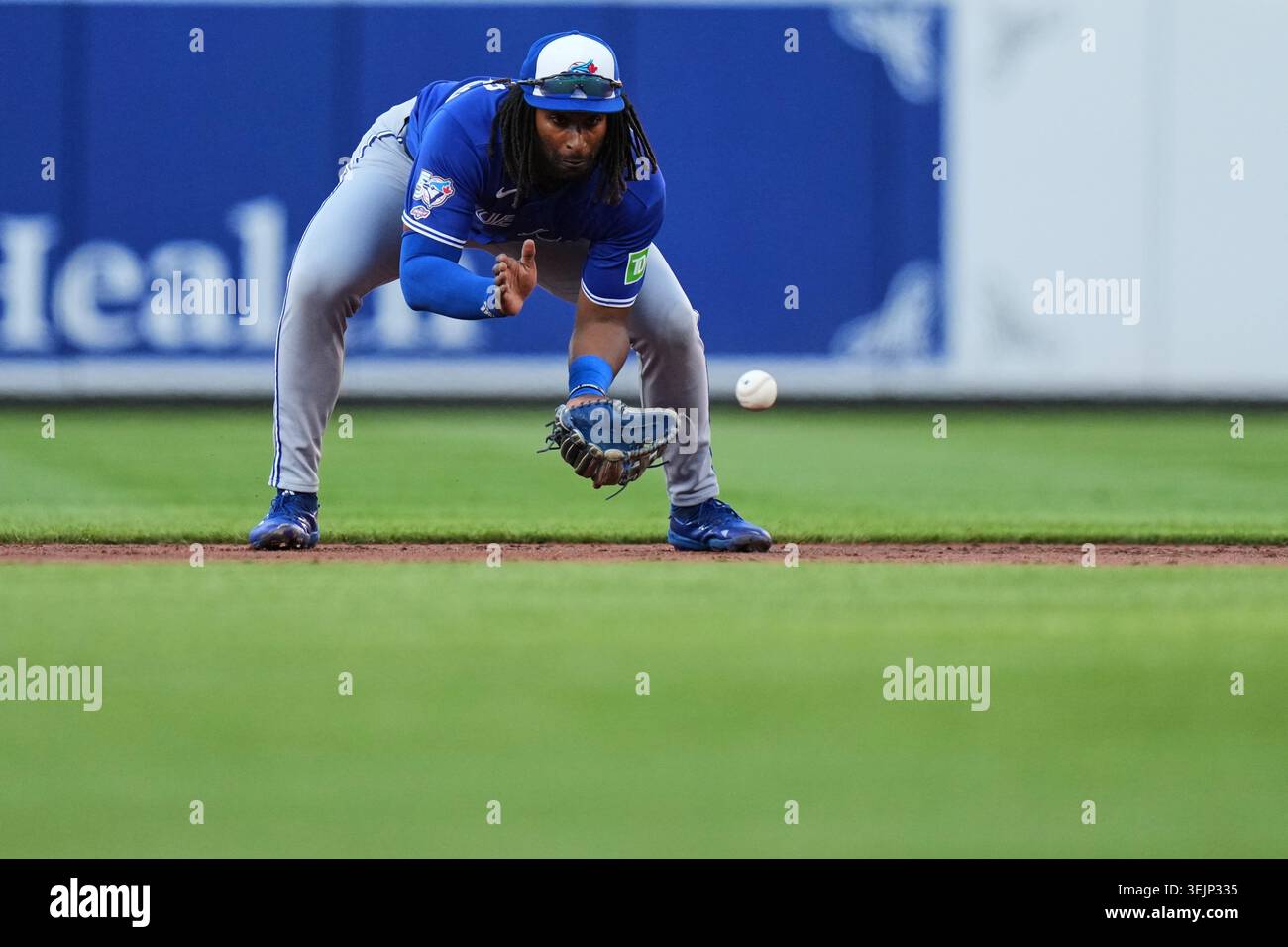 Toronto Blue Jays second baseman Charles McAdoo fields a ground ball ...