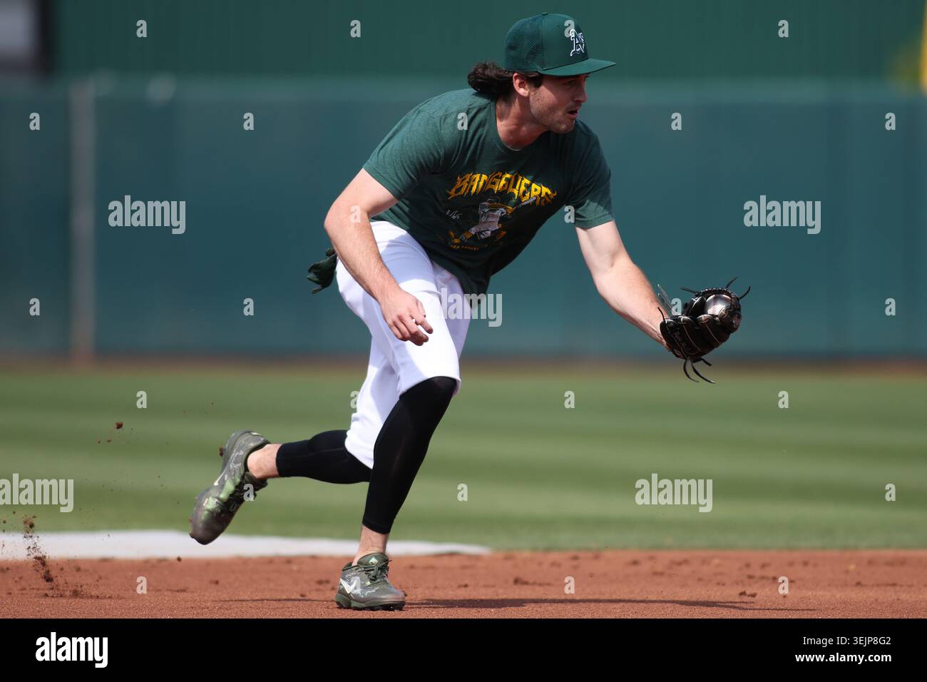 Athletics shortstop Jacob Wilson warms up before a baseball game ...