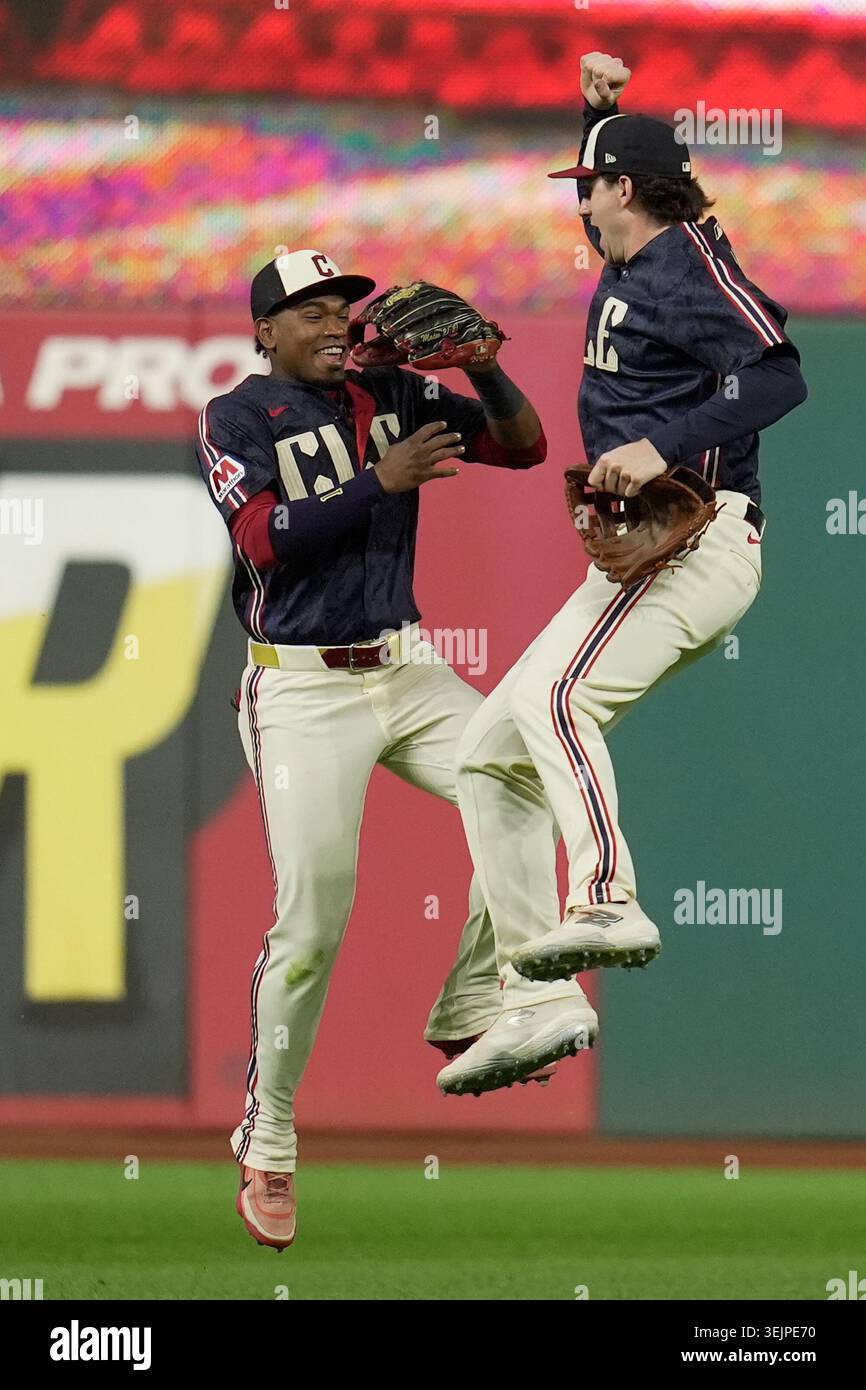 Cleveland Guardians left fielder Angel Martínez, left, and right ...