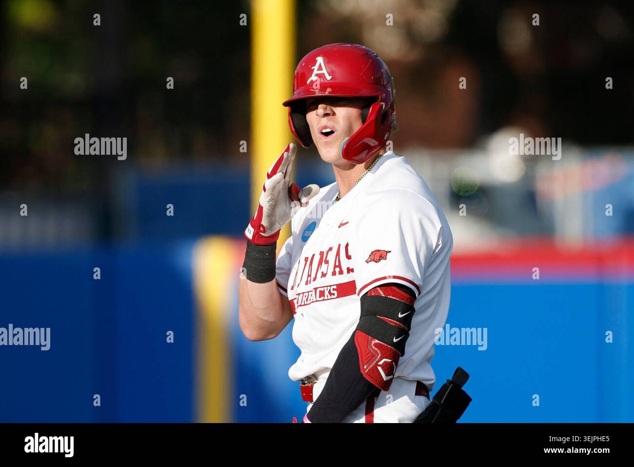 Arkansas' Maika Niu reacts after hitting an RBI double during the fifth ...