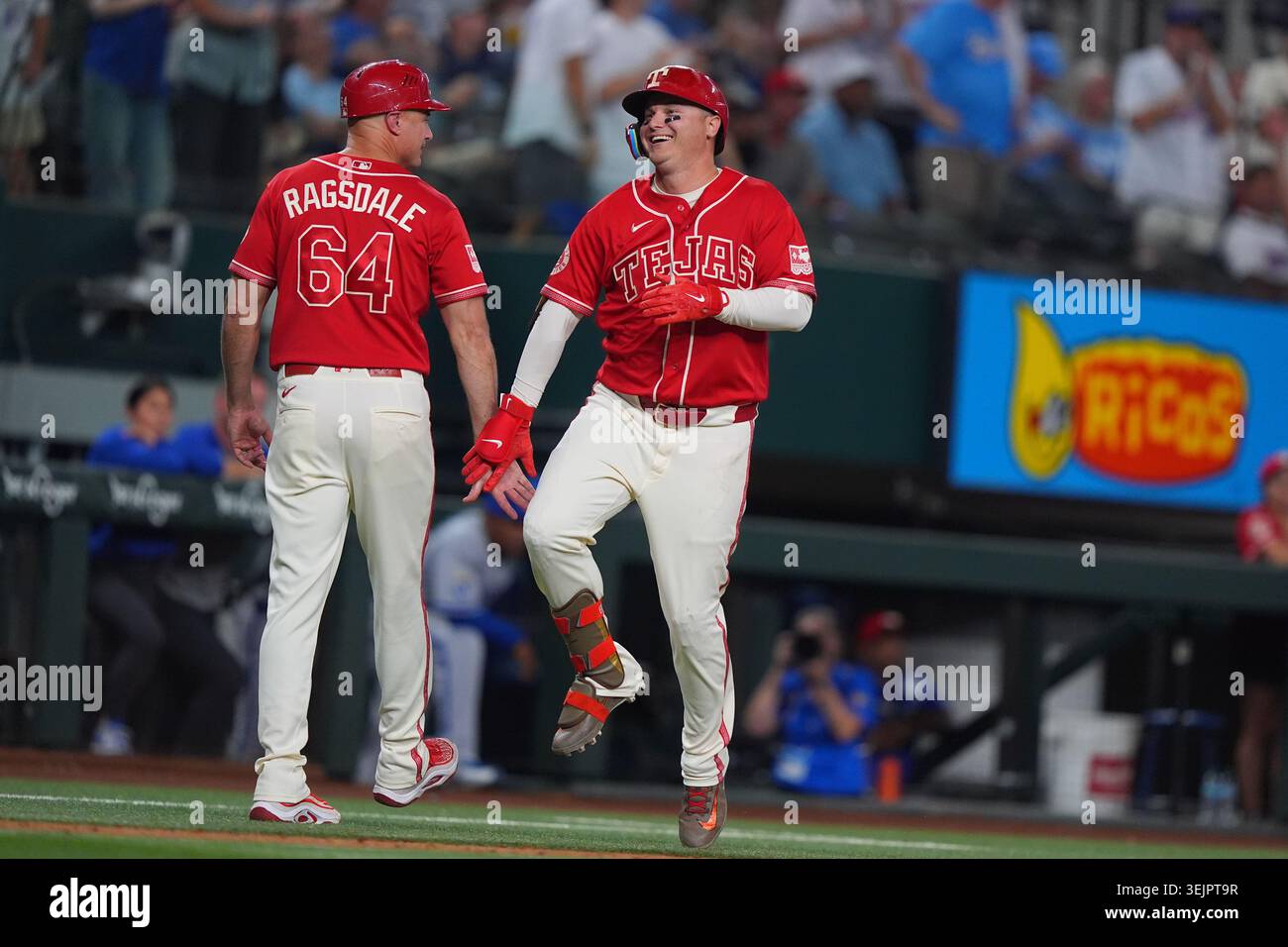 Texas Rangers' Joc Pederson, right, celebrates his home run with third ...
