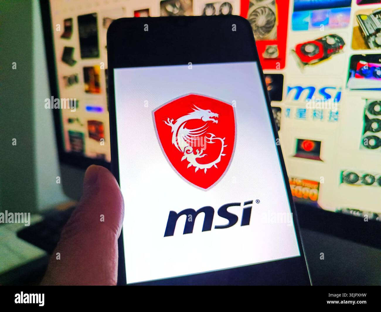 SUQIAN, CHINA - MAY 30, 2026 - A netizen is using his mobilephone to ...