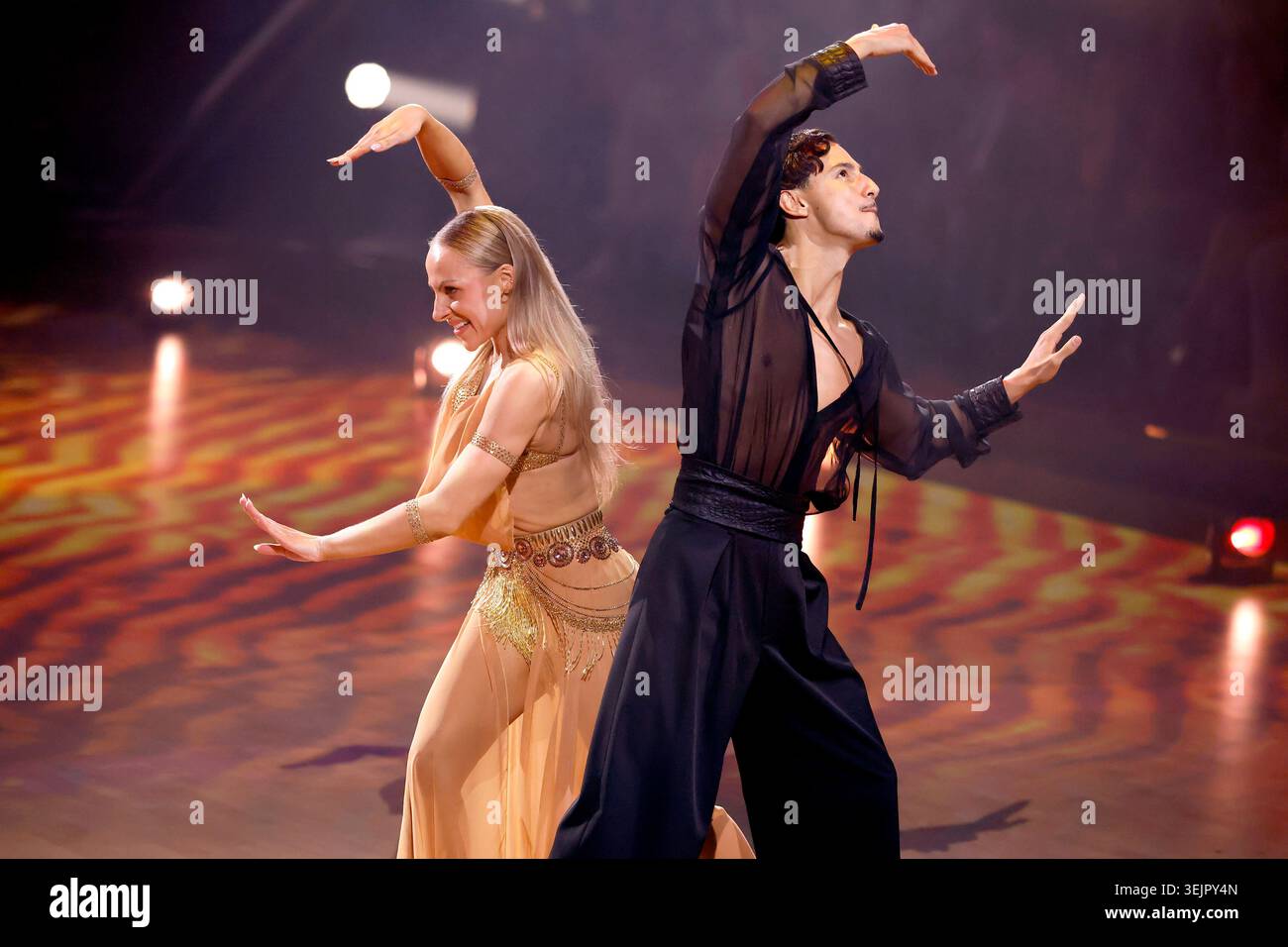Singer Milano (Milane Baybah) and professional dancer Marta Arndt place ...