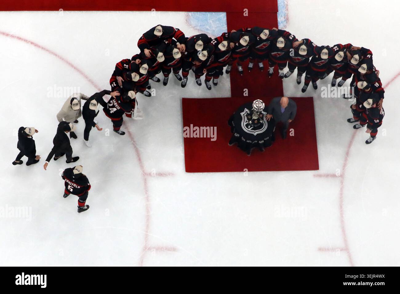 The Carolina Hurricanes accept the Prince of Wales Trophy following ...