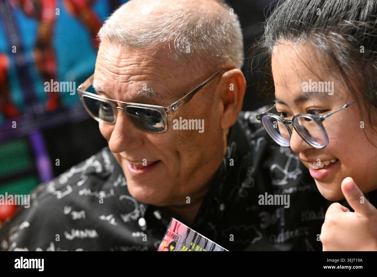 Bob Layton, an American comic book artist, posing photo with a lady at ...