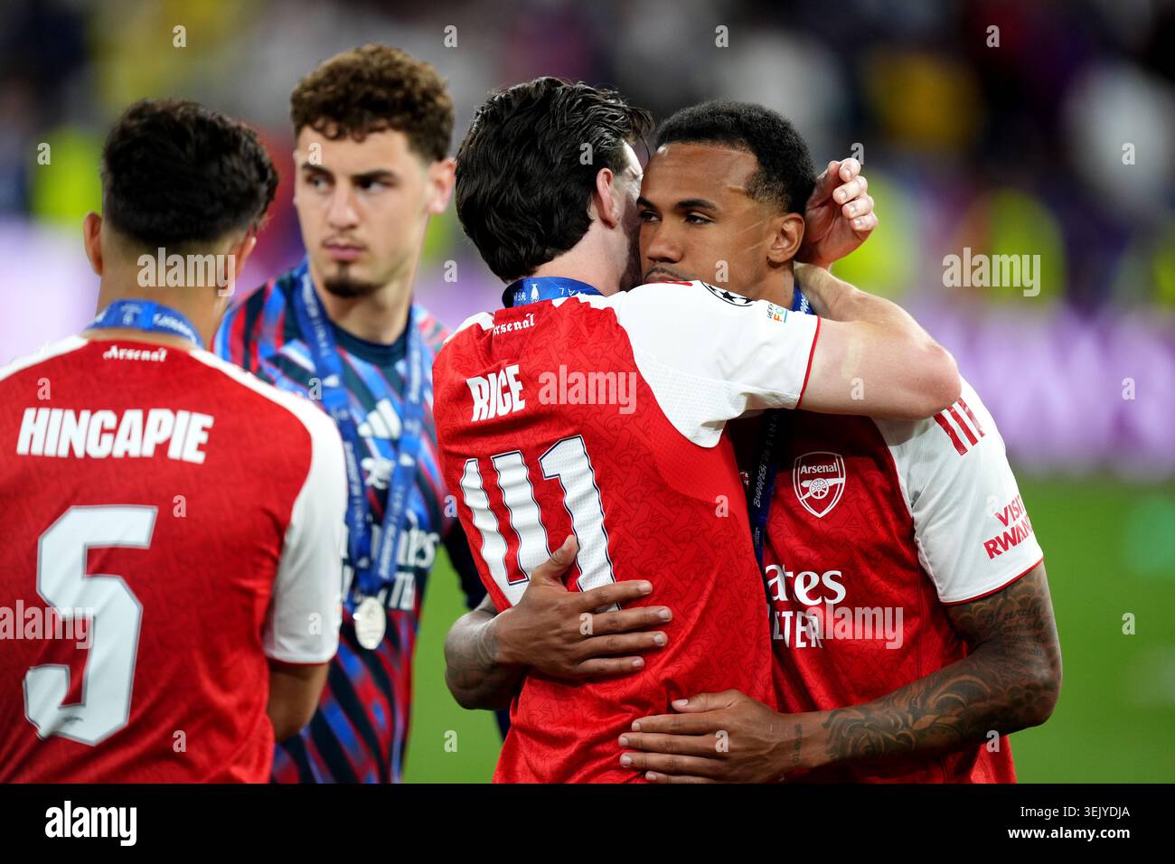 Arsenal's Gabriel (right) is consoled by teammate Declan Rice following ...