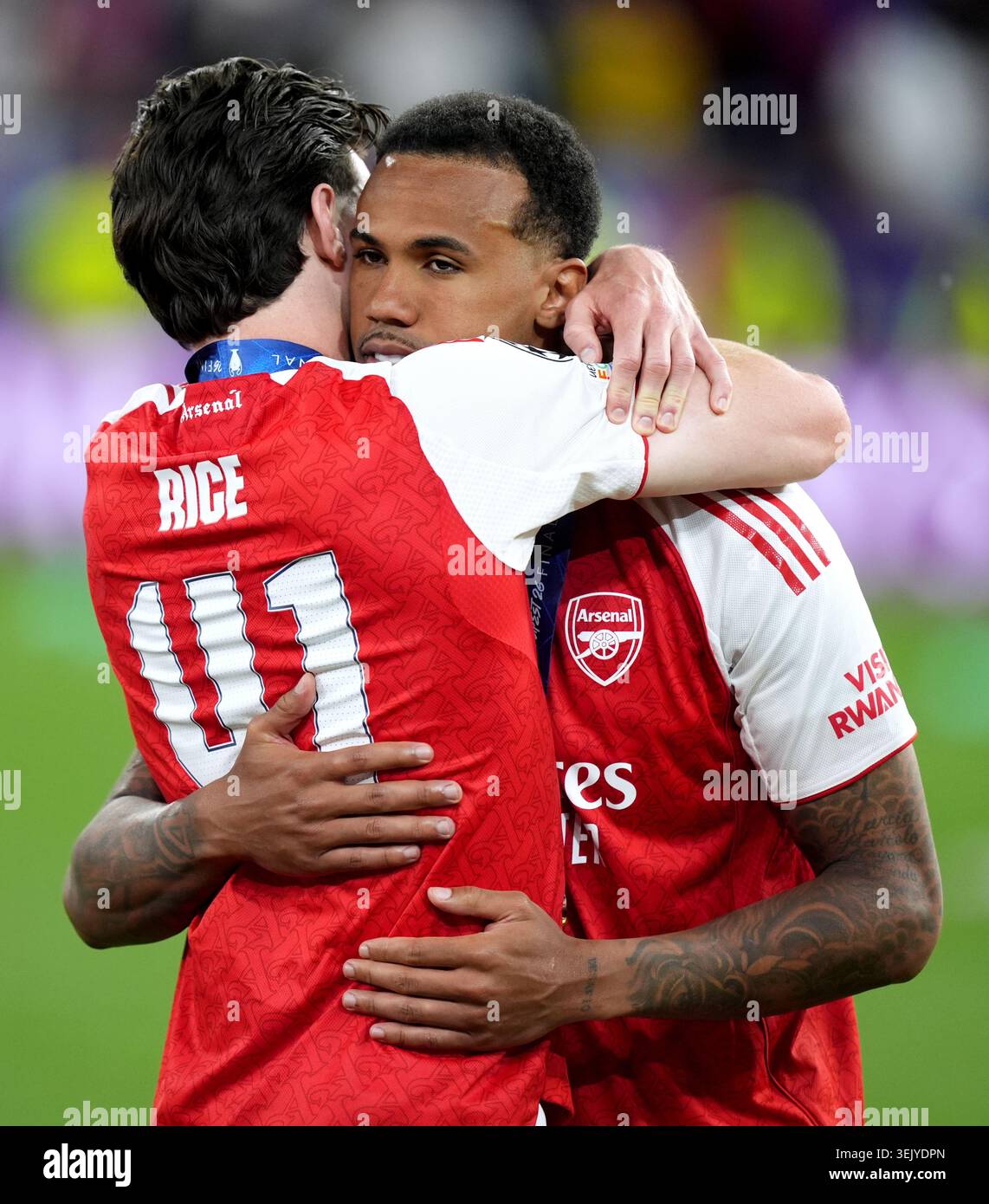 Arsenal's Gabriel (right) is consoled by teammate Declan Rice following ...
